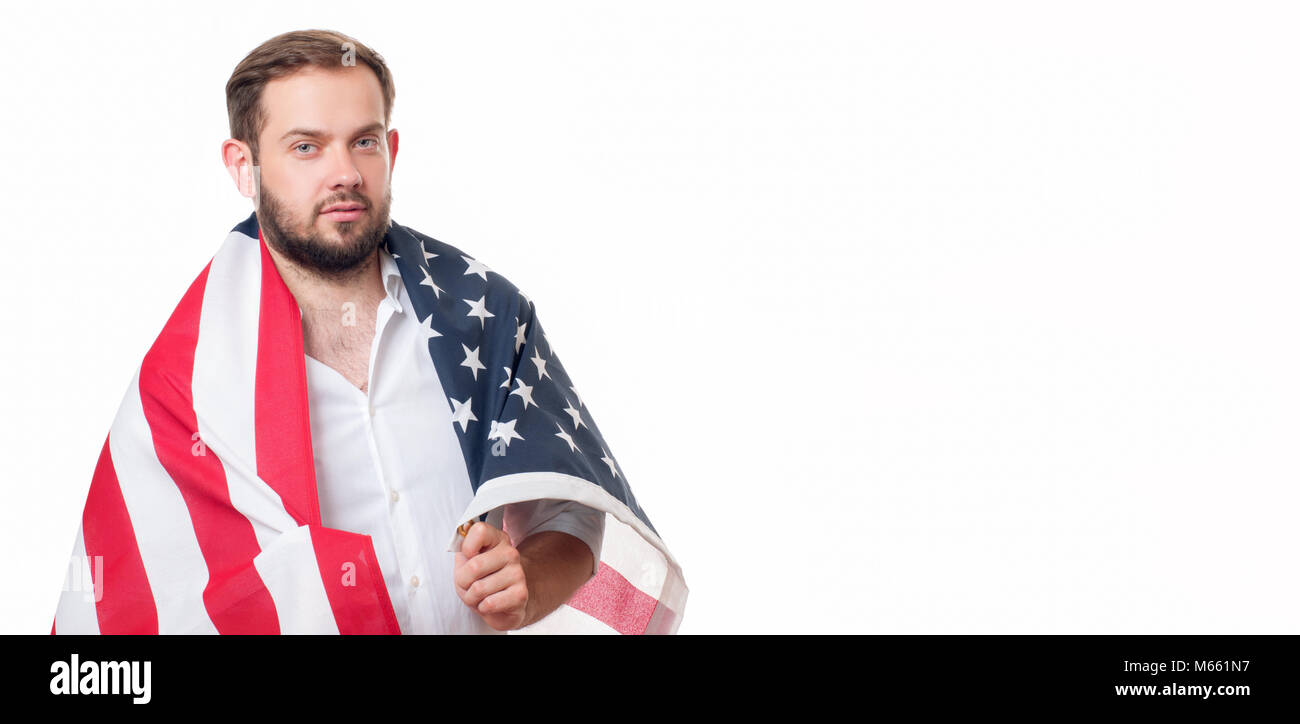 American flag. Smiling patriotic man holding United States flag. USA ...