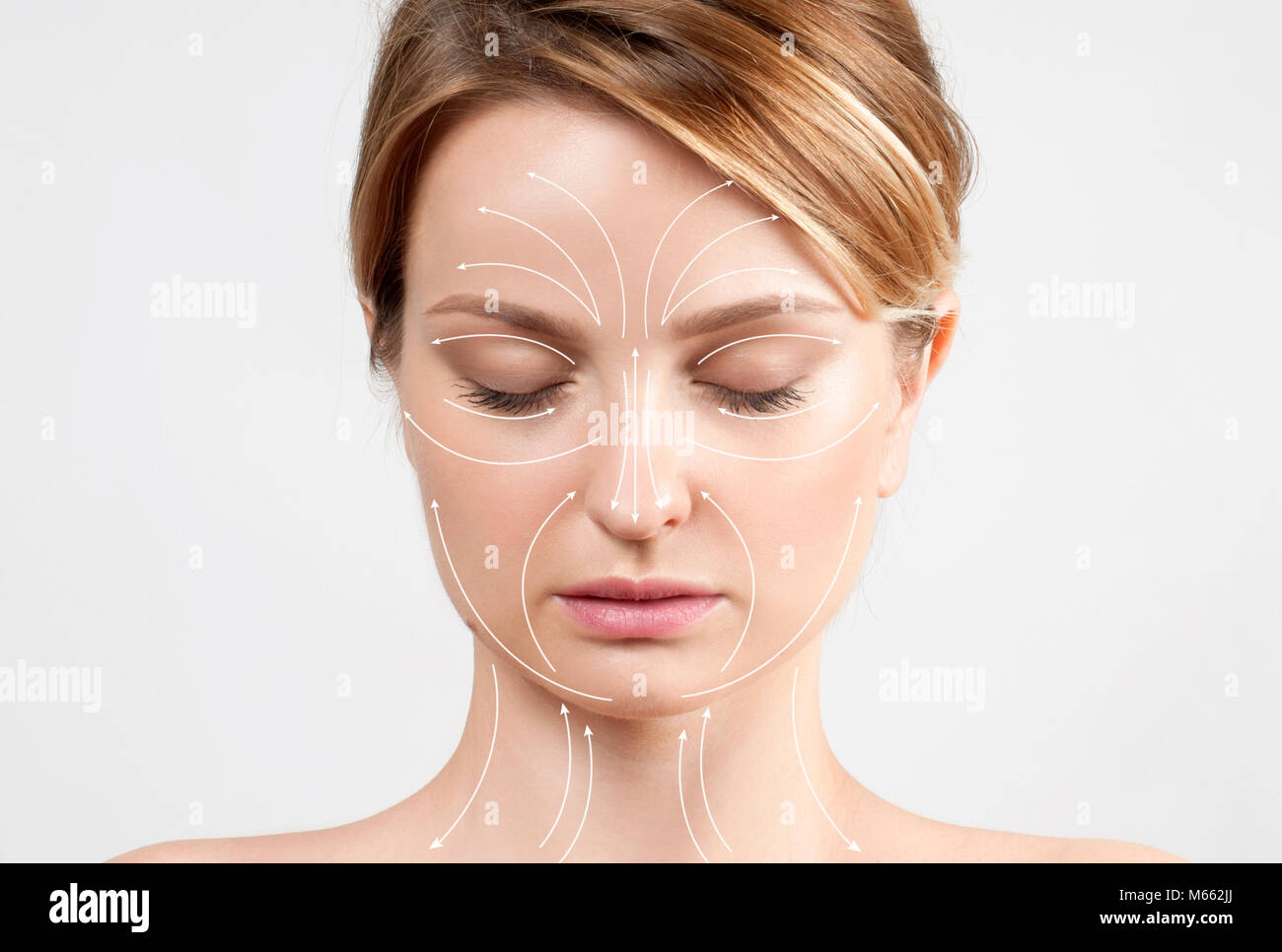 Face of woman with perfectly clean skin and massage facial lines. Skin ...