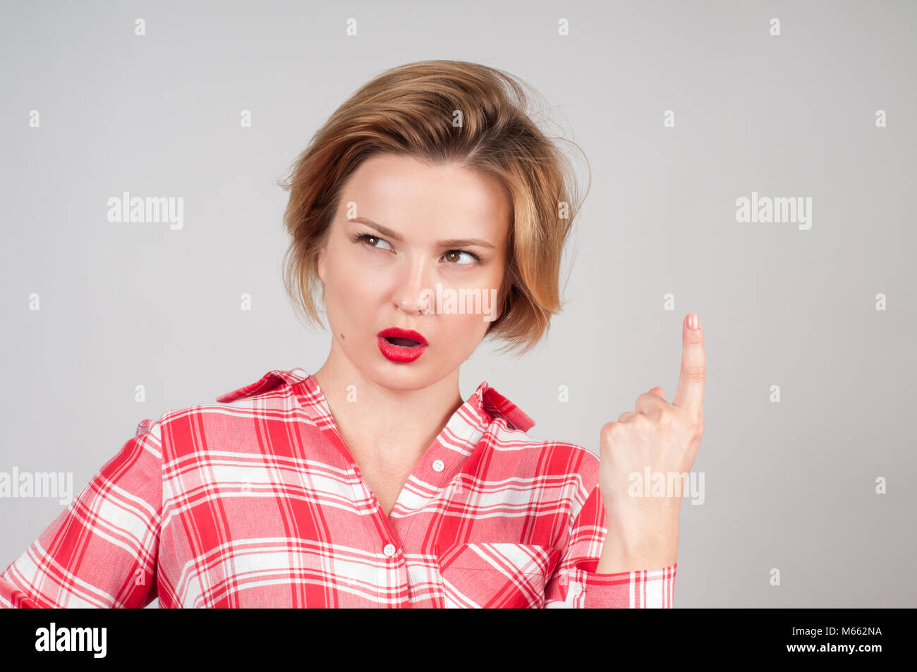 Portrait young business woman with questioning expression. Brainstorm ...