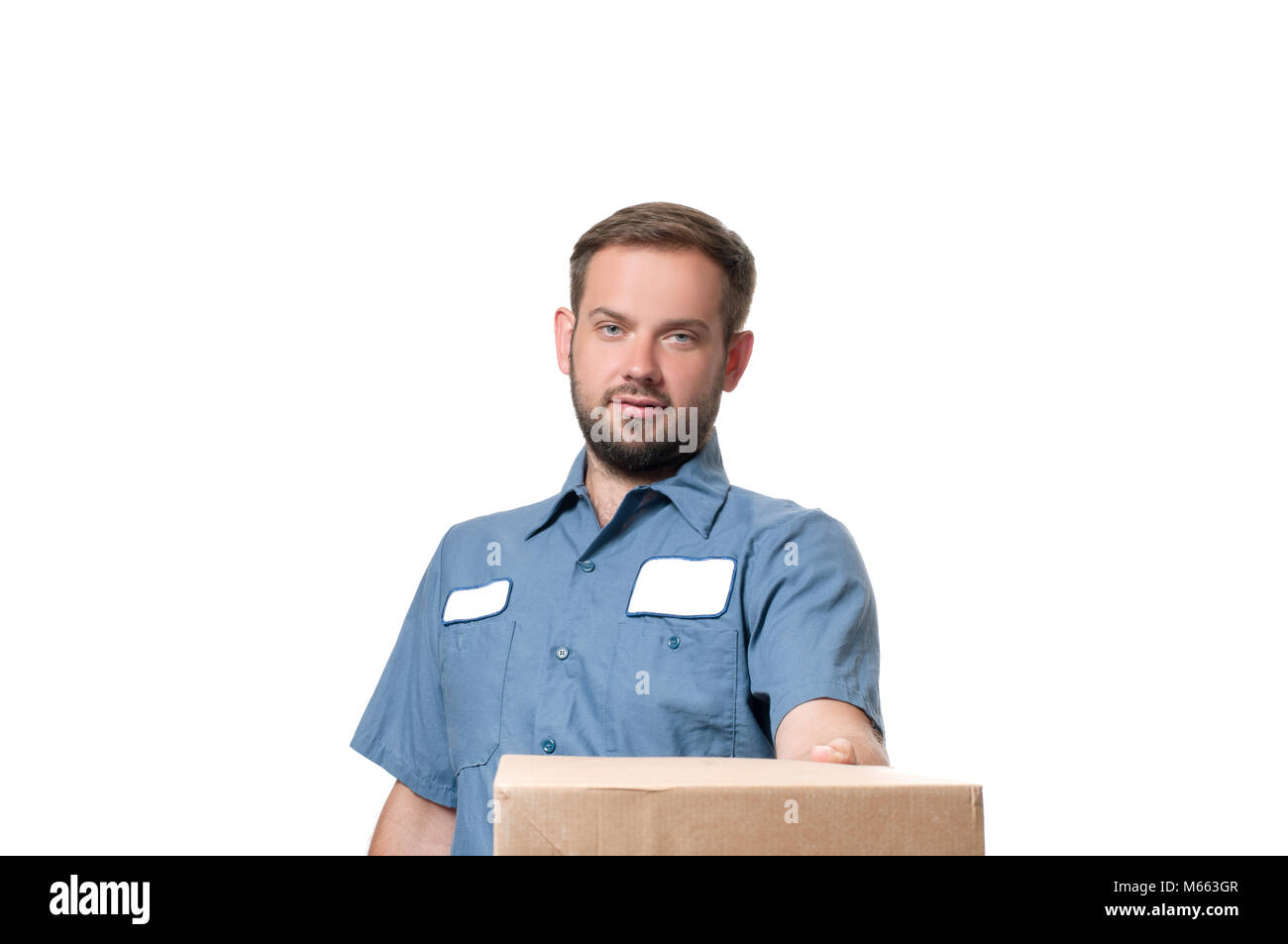 Portrait of happy delivery man with parcel on white background Stock ...