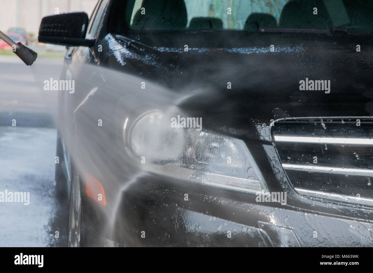 Car Washing. Modern Car Covered by Water. Closeup photo headlight Stock ...