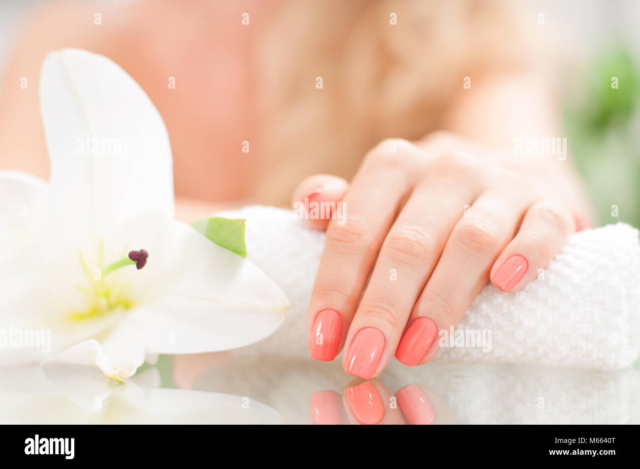 Manicure concept. Hand care at the spa. Beautiful woman's hand with ...