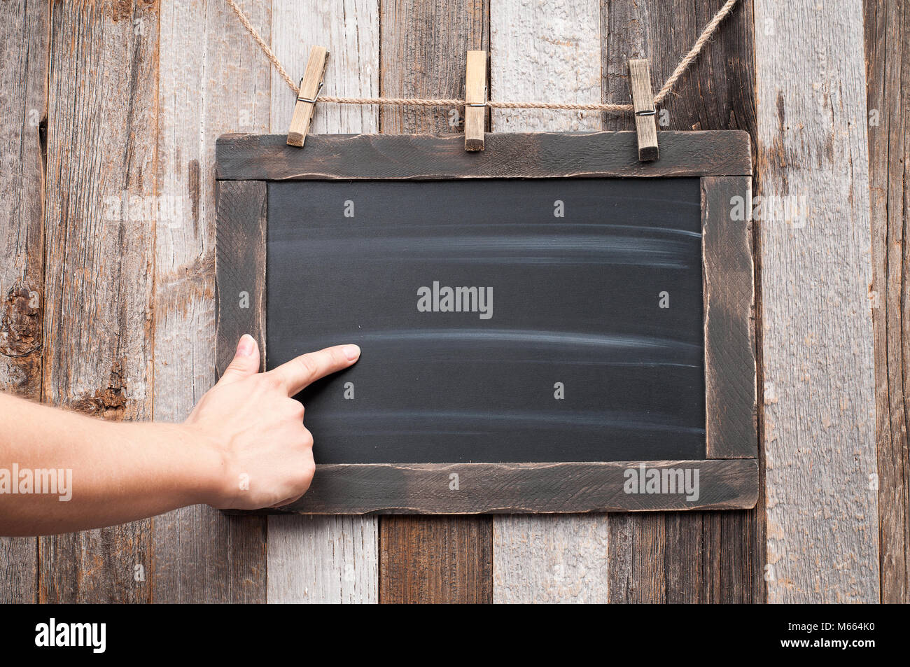 Hand showing on Chalkboard. Human hand pointing on blackboard Stock ...