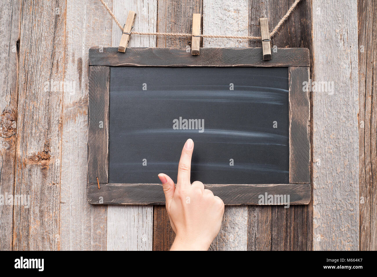 Hand showing on Chalkboard. Human hand pointing on blackboard Stock ...
