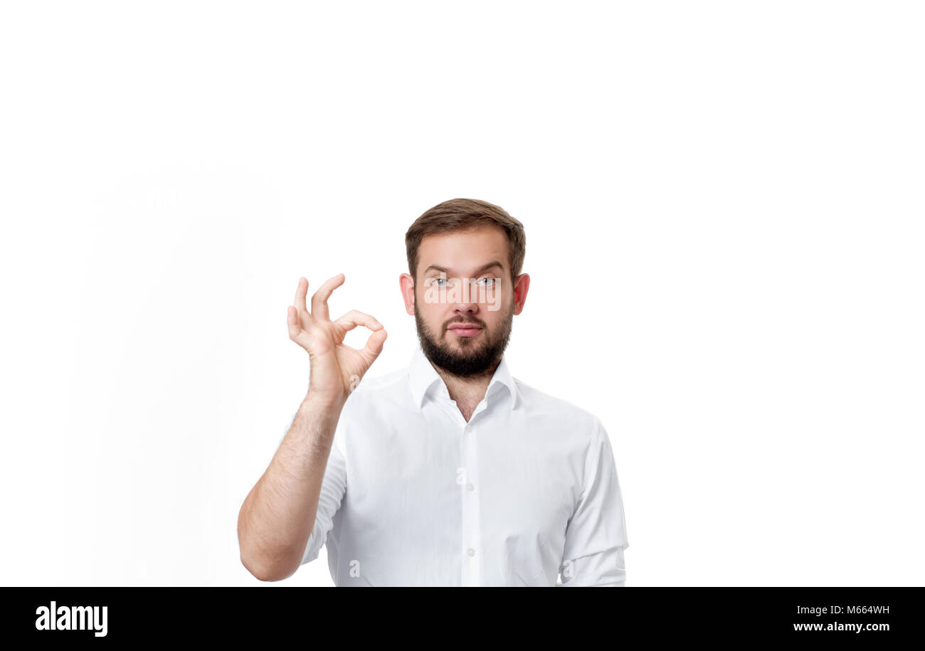 Business man doing OK sign on white background Stock Photo - Alamy