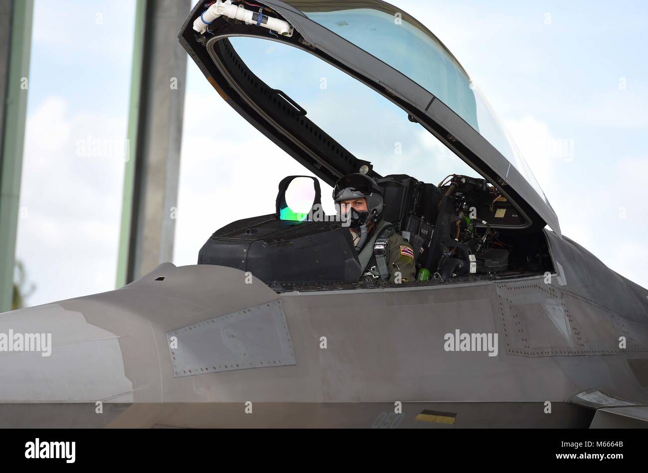 A pilot in 199th Fighter Squadron prepares his F-22 Rapter for takeoff ...