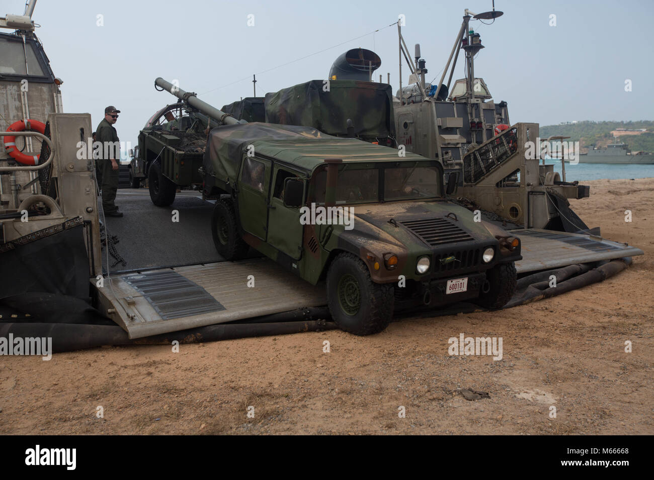 U.S. Marines with Marine Air Support Squadron Two unload direct air ...
