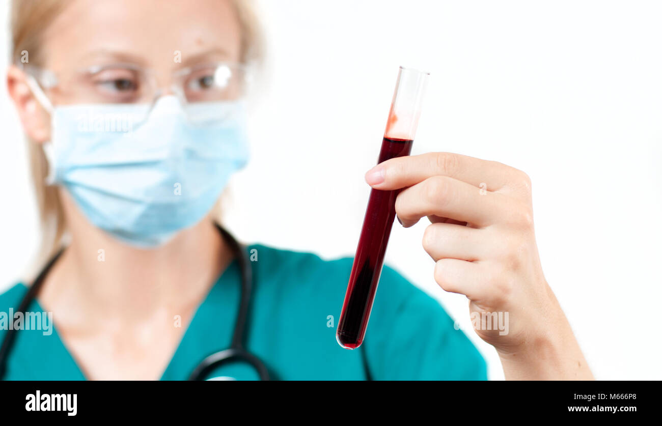 Female doctor doing the blood test in medical laboratory Stock Photo ...