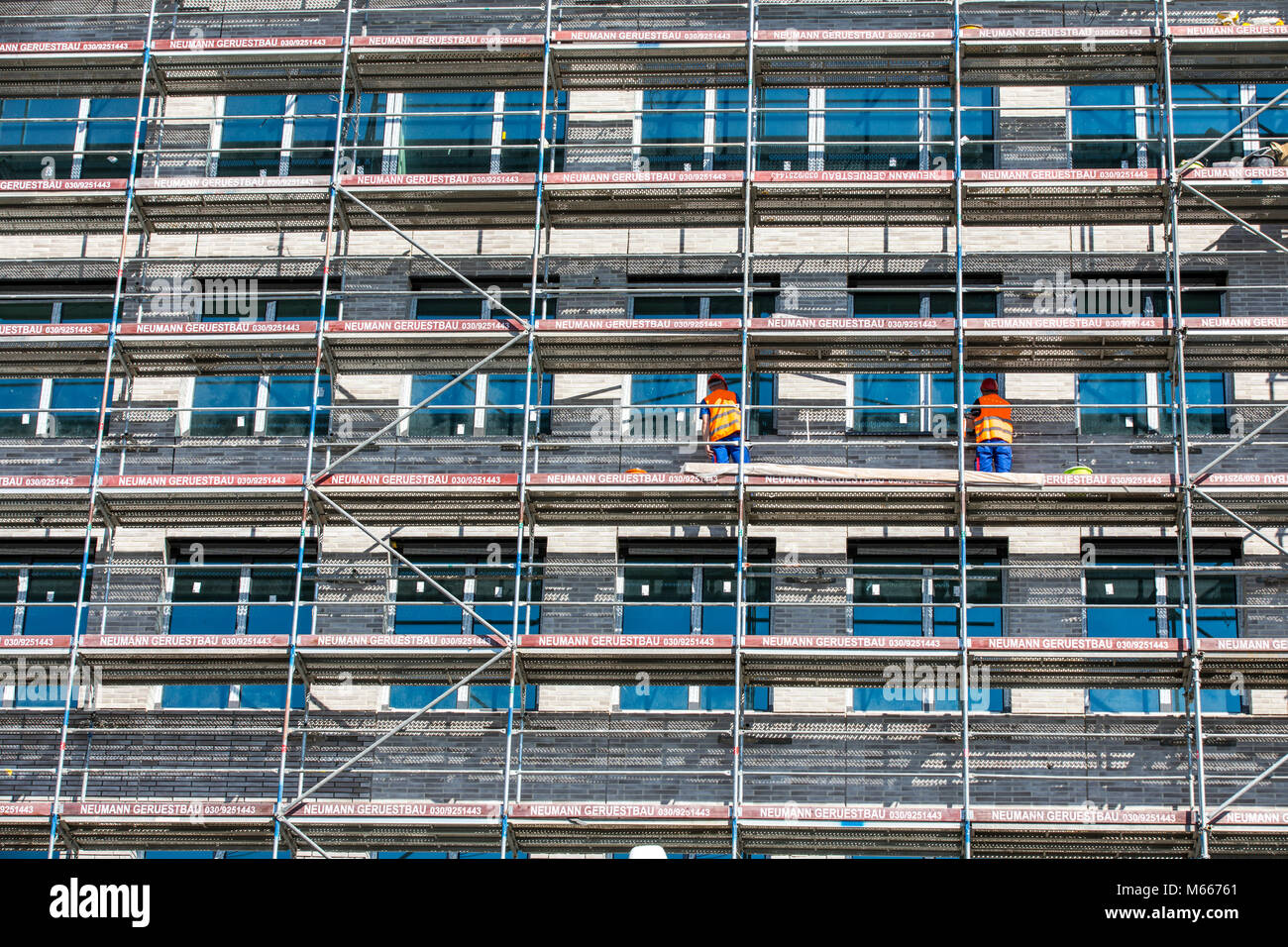 Construction site, scaffolding, construction work Stock Photo - Alamy