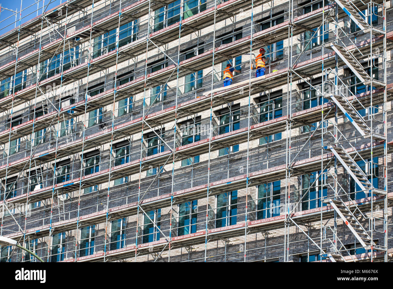 Construction site, scaffolding, construction work Stock Photo - Alamy