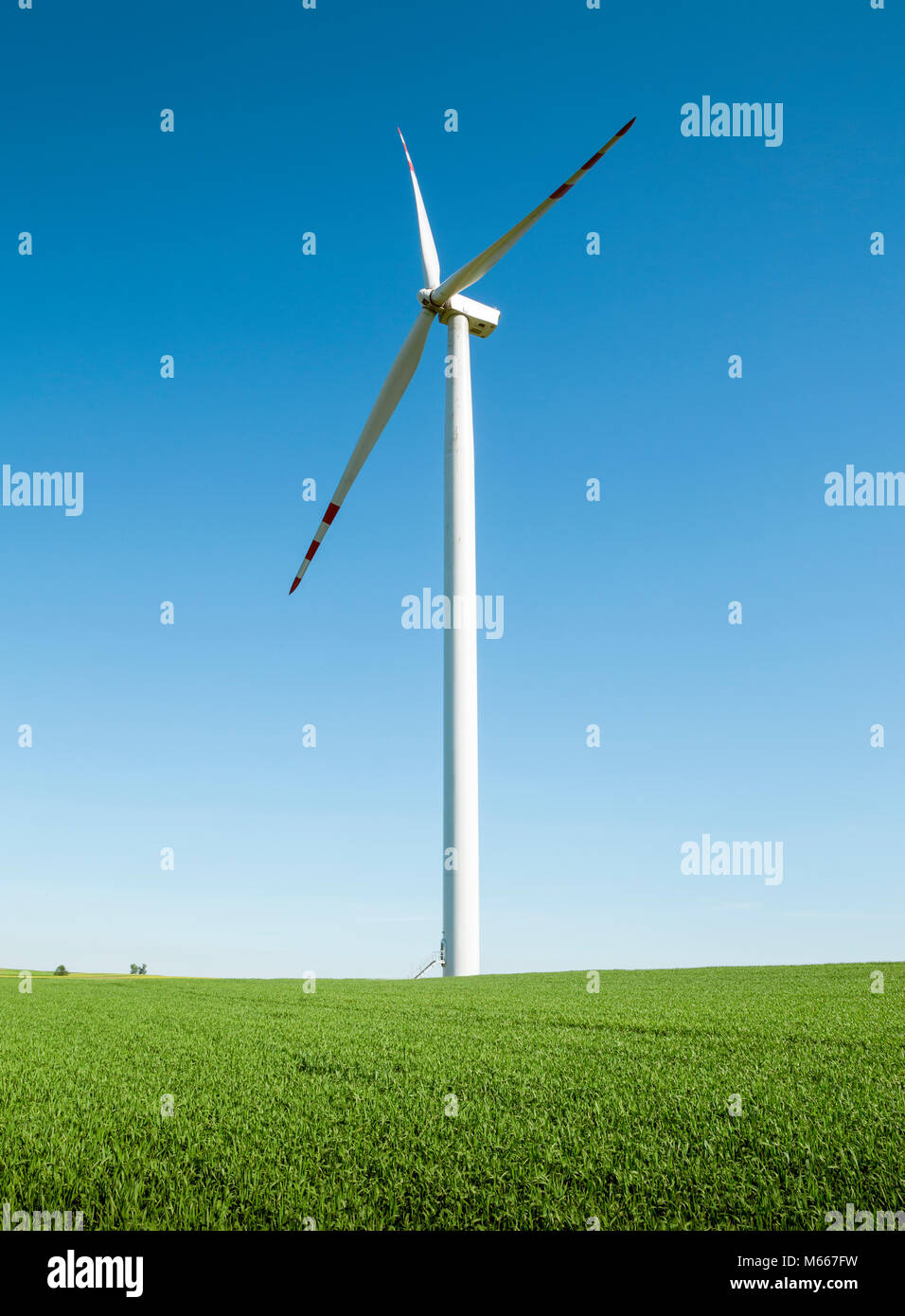 Clean energy - wind turbine generating electric power Stock Photo - Alamy