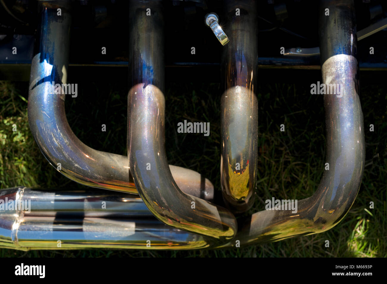 An exhaust manifold installed on an historic Hot-Rod Stock Photo - Alamy