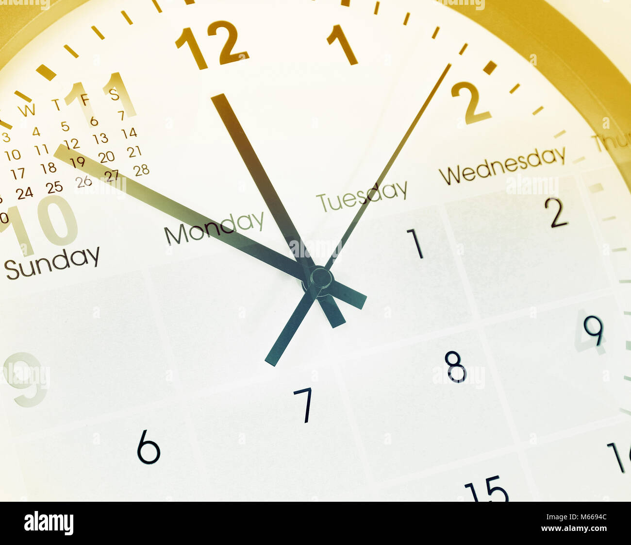Clock face and calendar composite Stock Photo - Alamy