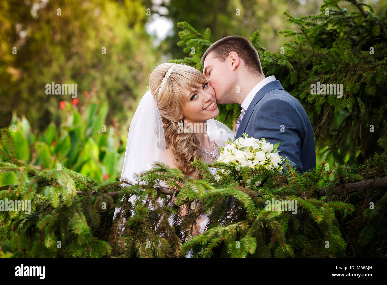 Happy bride and groom on their wedding day Stock Photo - Alamy