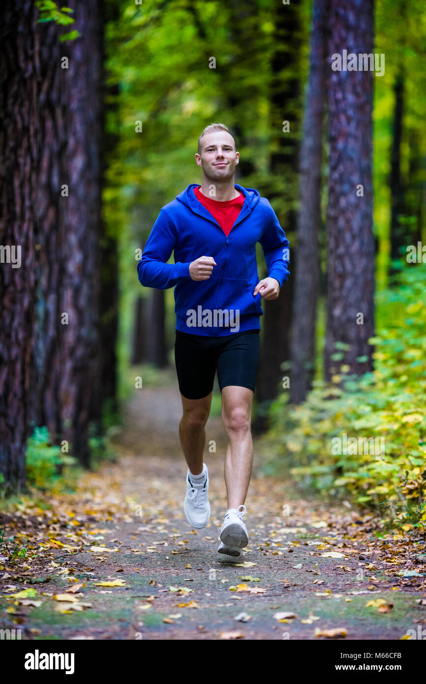 Healthy lifestyle - young man running Stock Photo - Alamy