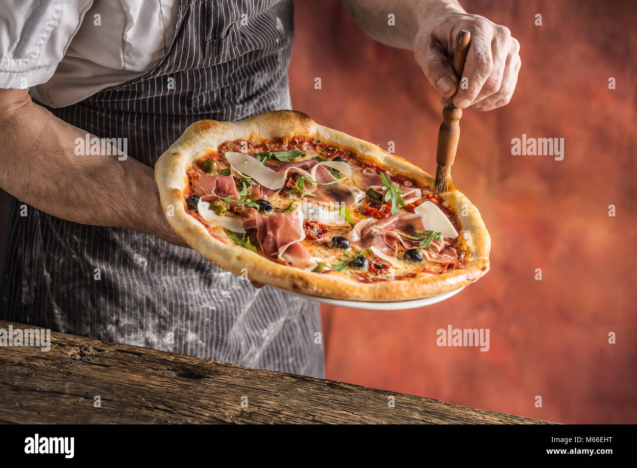 Chef prepares pepperoni pizza hi-res stock photography and images - Alamy