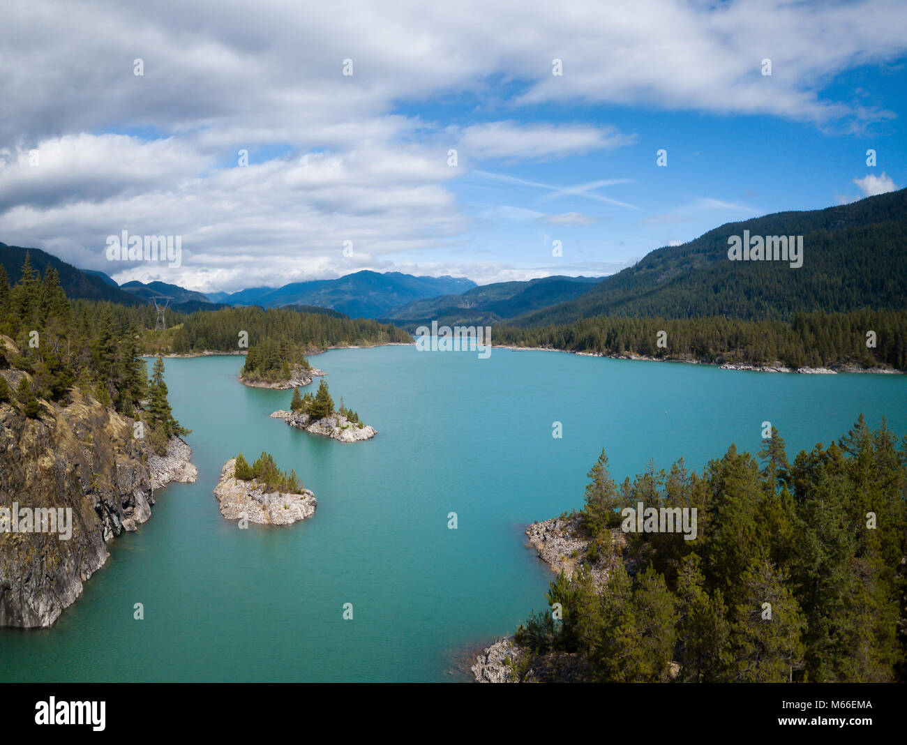 Aerial drone panoramic landscape view of Daisy Lake during a bright ...
