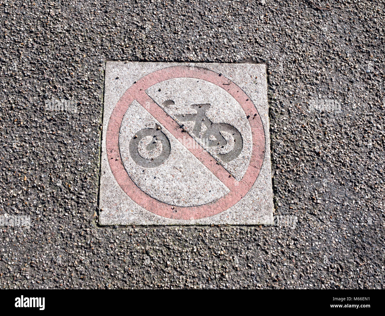 No bicycle riding or skateboarding on sidewalk pavement sign hi-res ...