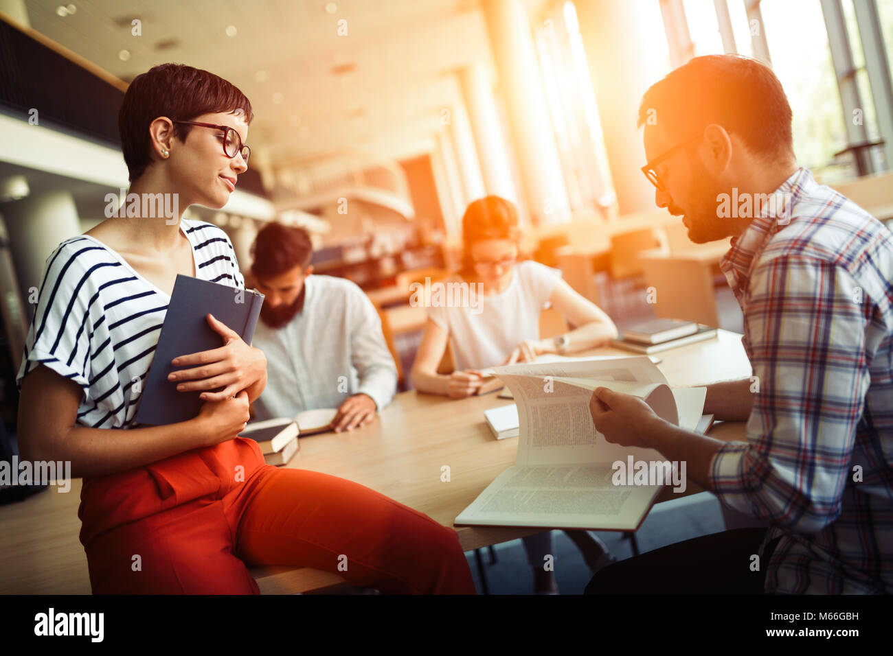Group of college students working together in the school Stock Photo ...