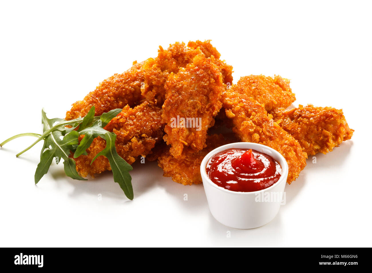 Fried chicken nuggets on white background Stock Photo - Alamy
