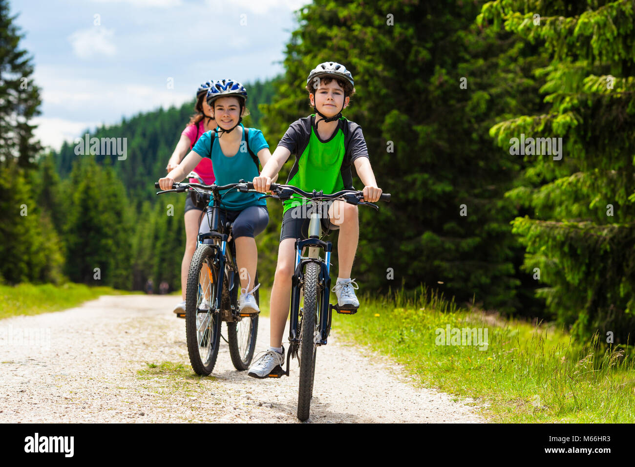 Active family biking Stock Photo - Alamy