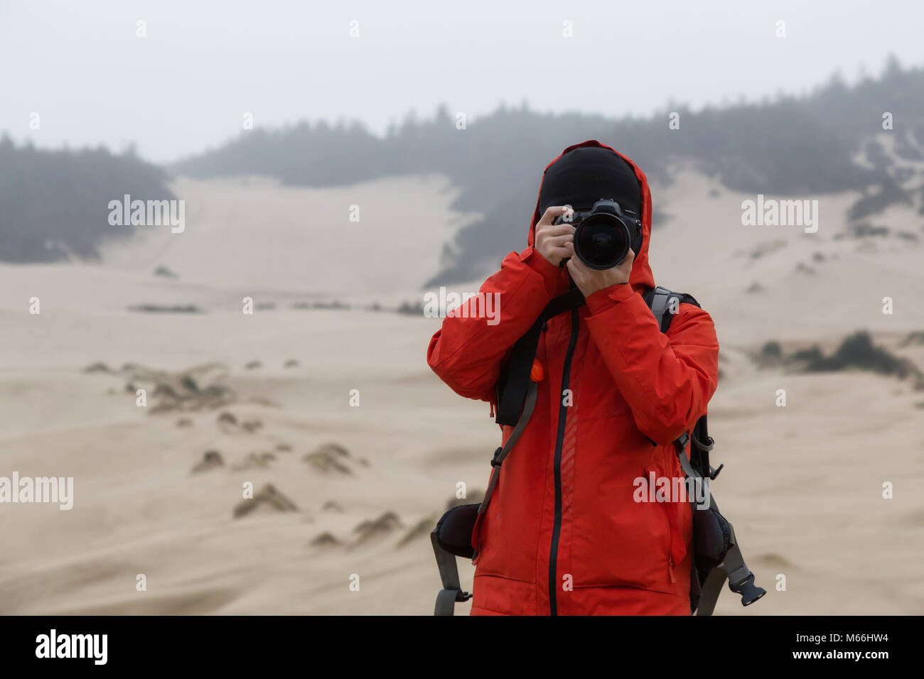 Photographer taking pictures of the beautiful landscape. Taken in ...