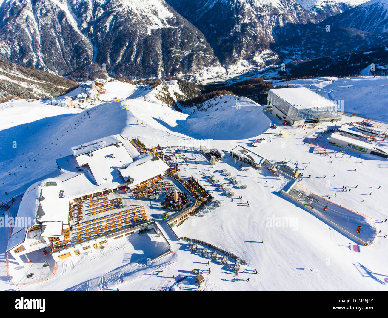 Ski resort restaurant on top of the Alps, Aerial view Stock Photo - Alamy