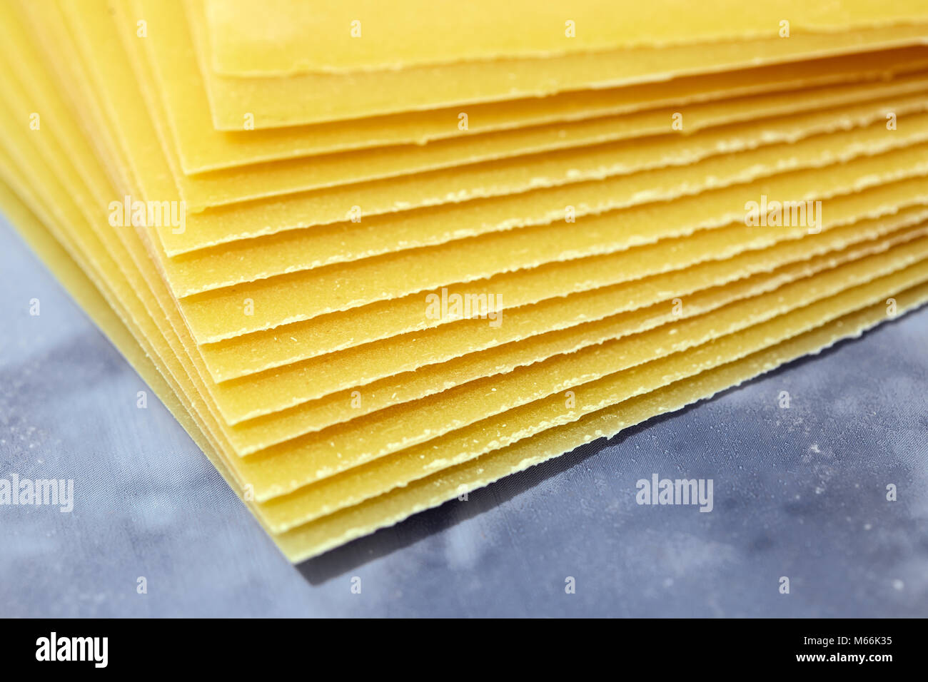 A stack of lasagna sheets in closeup Stock Photo - Alamy