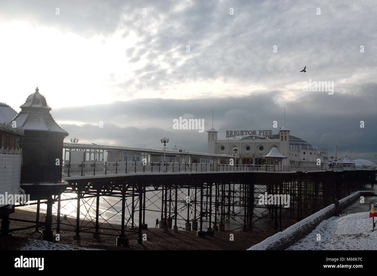 Brighton Pier (aka Palace Pier) in Brighton covered in snow Stock Photo ...
