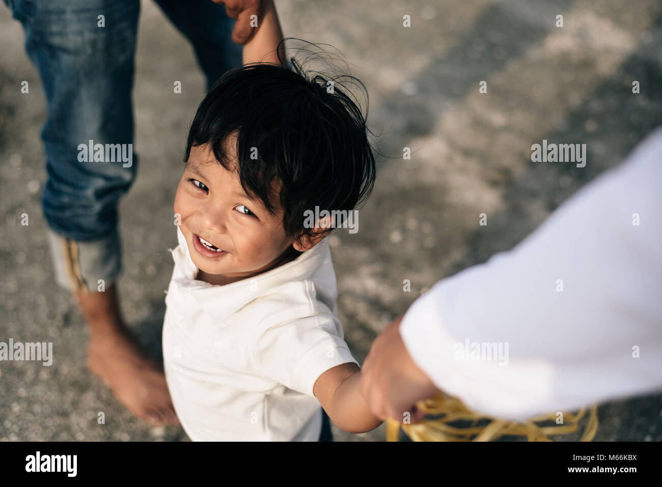 Young asian boy laughing hi-res stock photography and images - Alamy