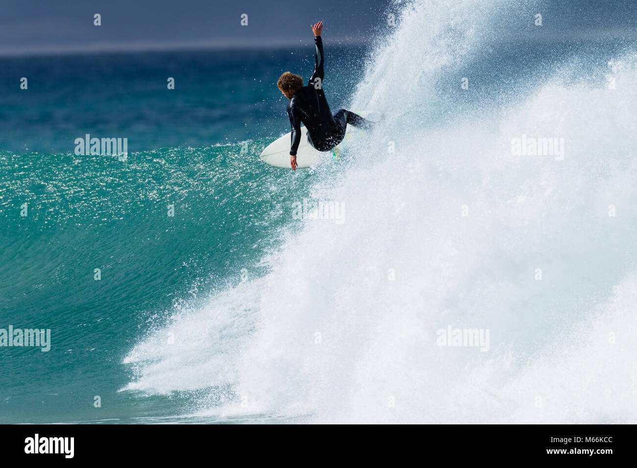 Surfer rear unidentified photo surfing action speed top turn on fast ...