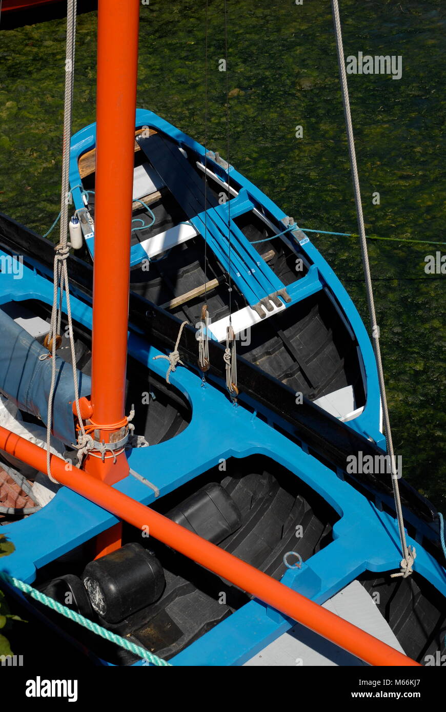 Two boats moored alongside in Galway harbour Stock Photo - Alamy