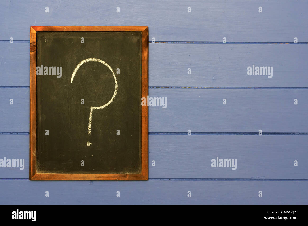slate chalk board with scribed Question Mark on shabby blue board ...