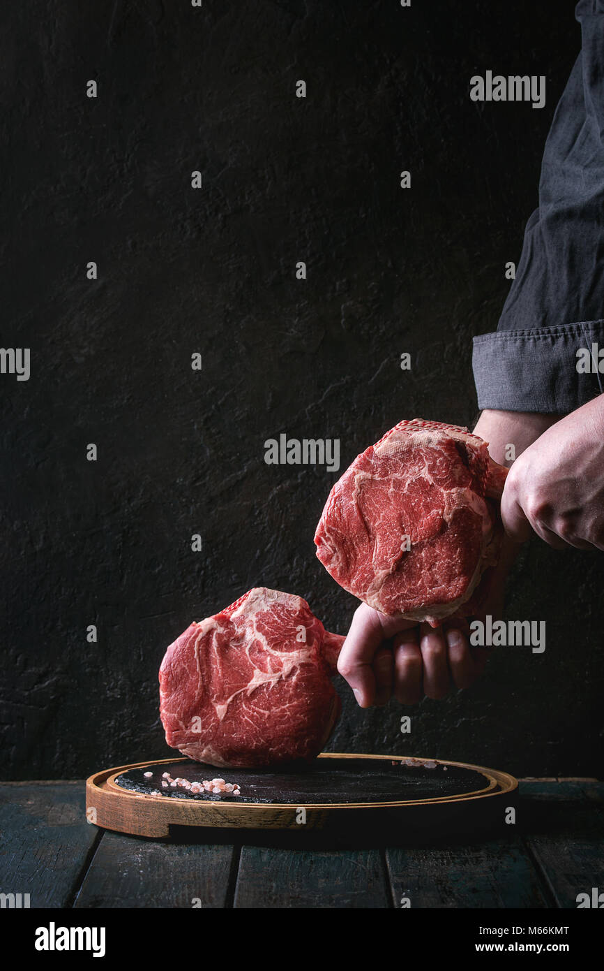 Raw tomahawk steak Stock Photo - Alamy