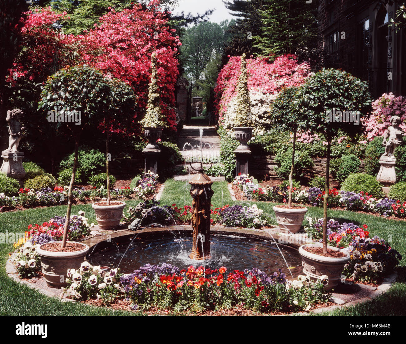 FORMAL GARDEN AND FOUNTAIN IN FULL SPRINGTIME BLOOM - kg11316 HAM001 ...