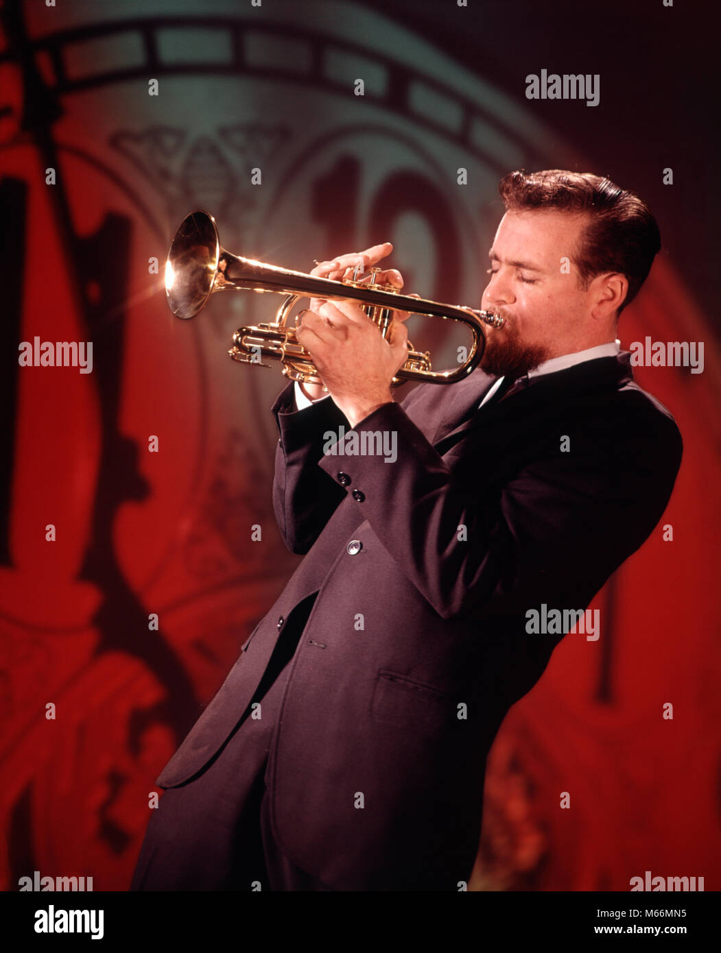 Man playing brass instrument hi-res stock photography and images - Alamy