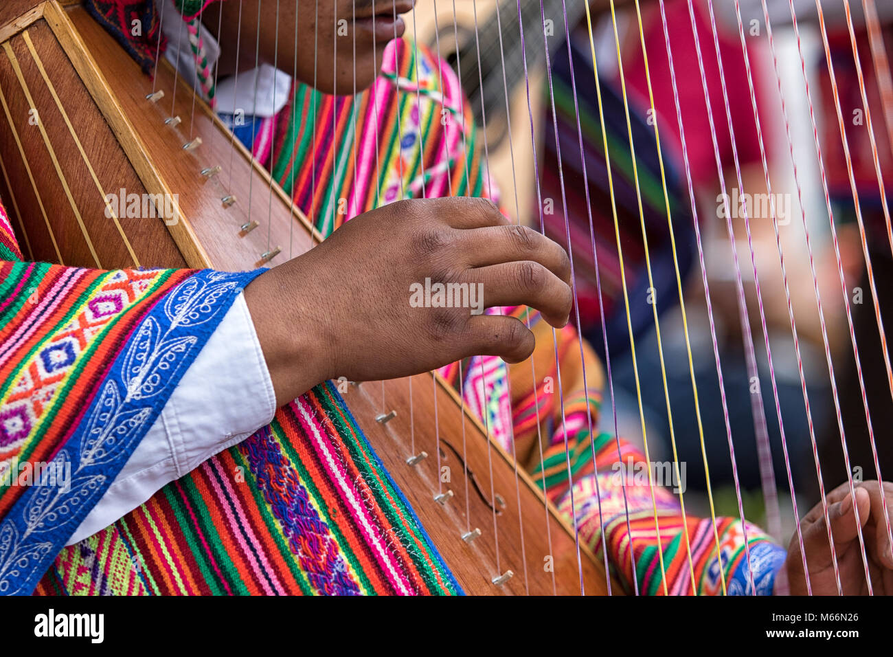 Otavalo, Ecuador - February 17, 2018: hand of a Peruvian indigenous ...