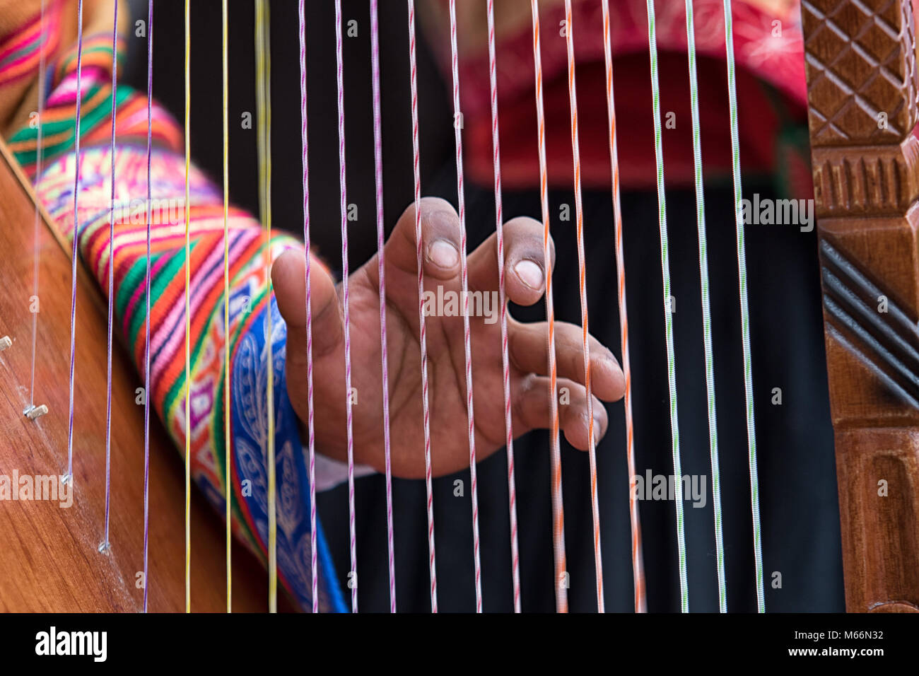 Otavalo, Ecuador - February 17, 2018: hand of a Peruvian indigenous ...