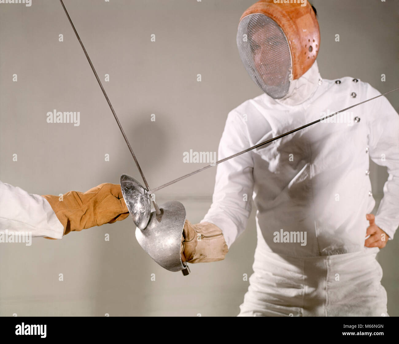 Dueling men swords hi-res stock photography and images - Alamy