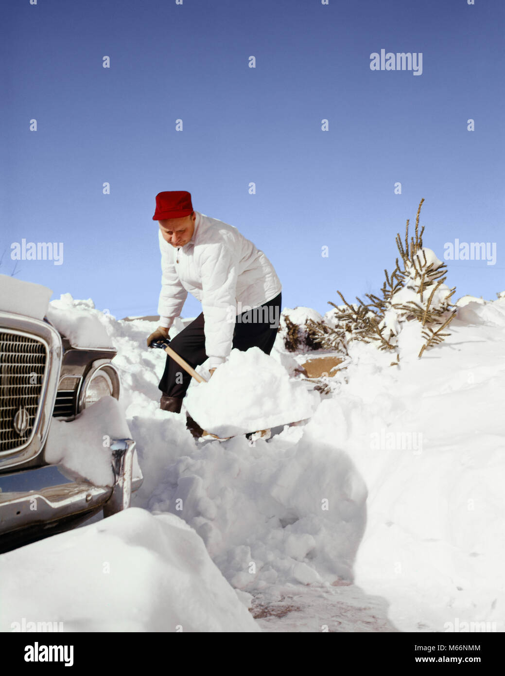 Digging Out A Snow Covered Car