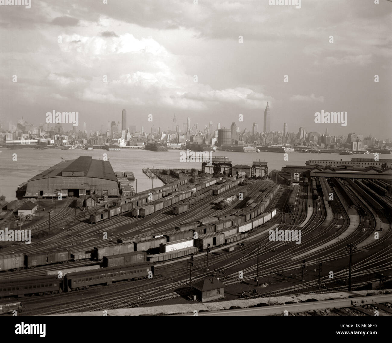 1940s NEW YORK CITY MANHATTAN MIDTOWN SKYLINE FROM RAILROAD YARD IN NEW ...