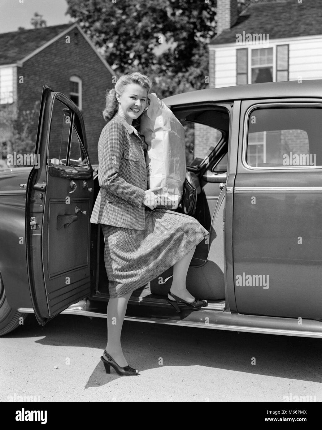 Happy adult woman getting Black and White Stock Photos & Images - Alamy