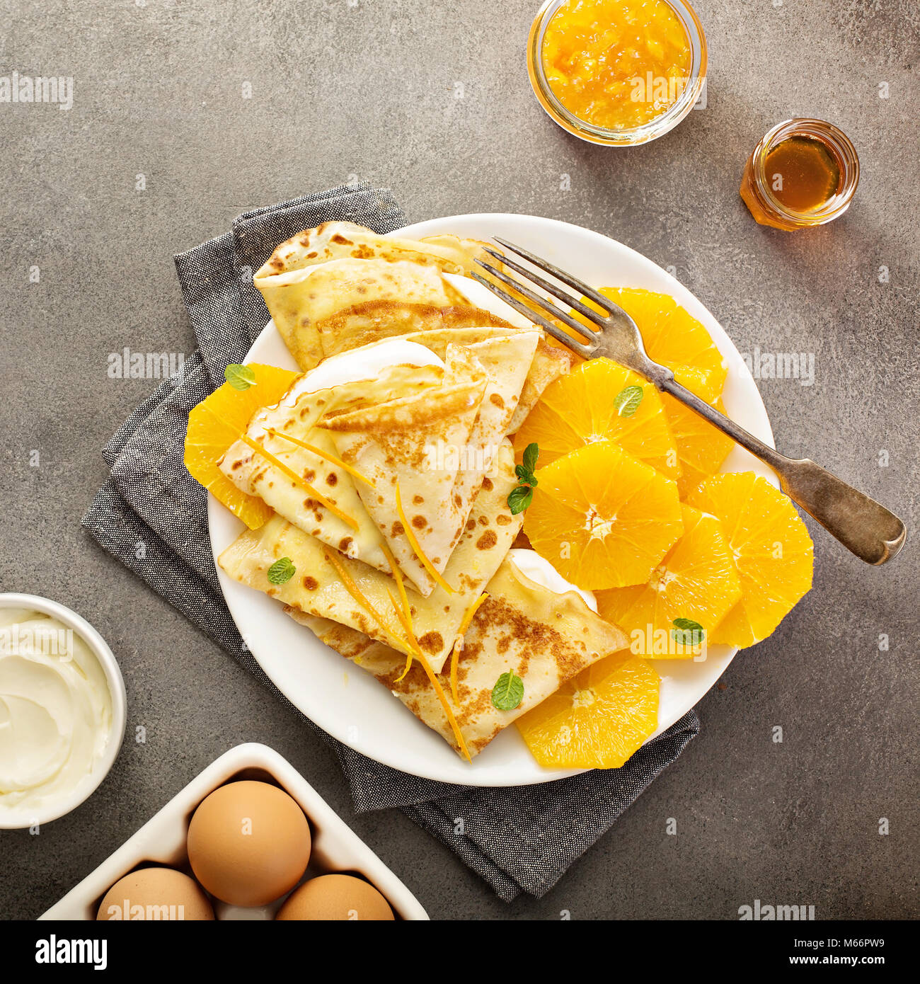 Crepes suzette with oranges Stock Photo - Alamy