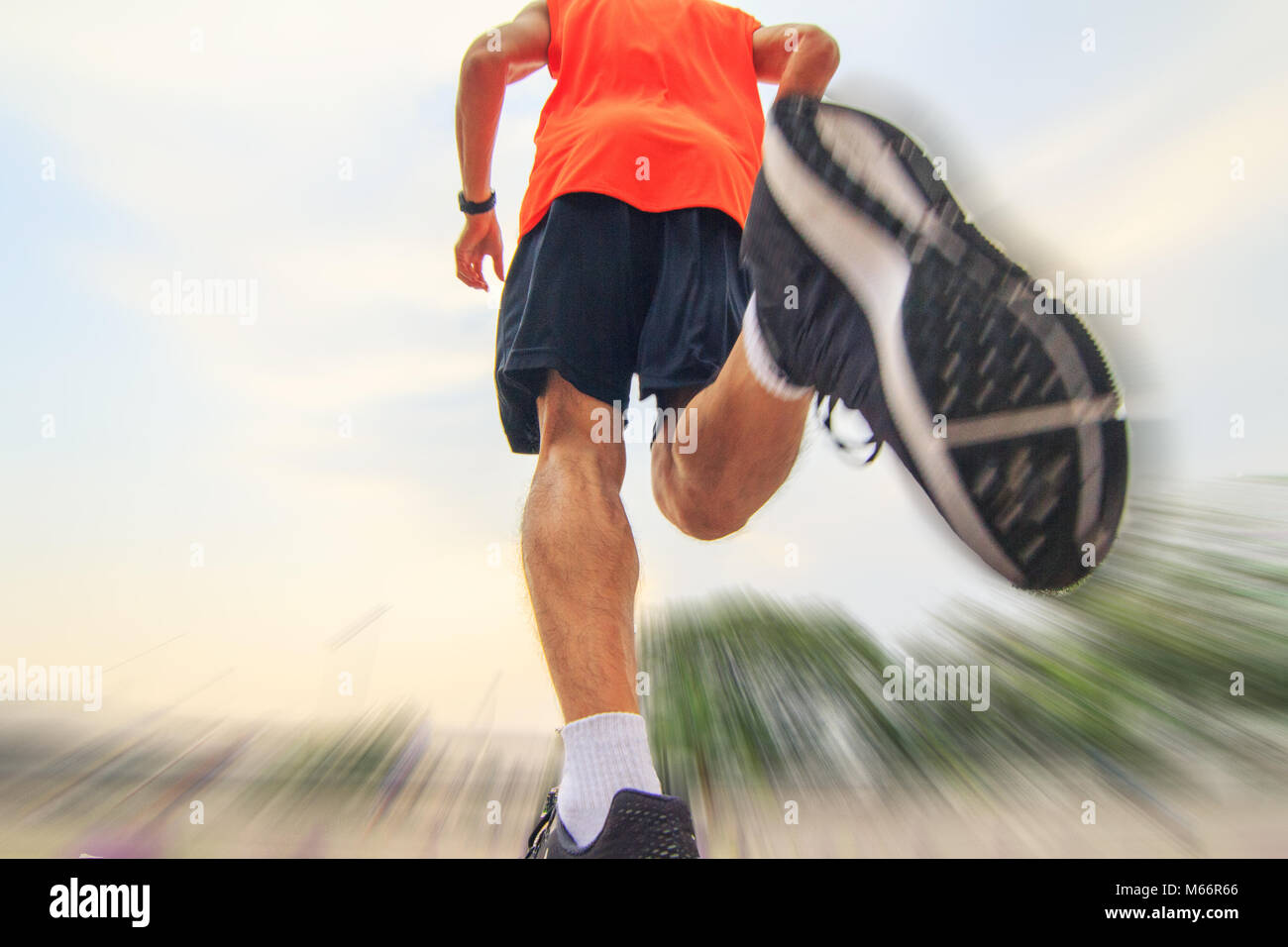 Blur zoom in The man running Stock Photo - Alamy