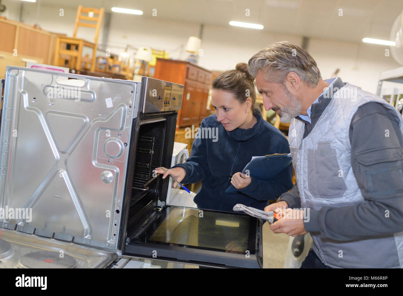 Oven technician hi-res stock photography and images - Alamy