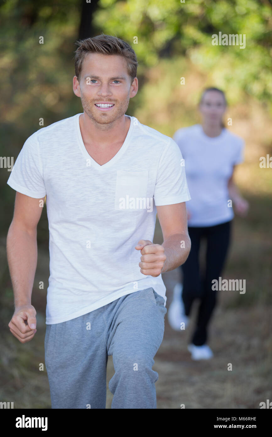 young man jogging Stock Photo - Alamy