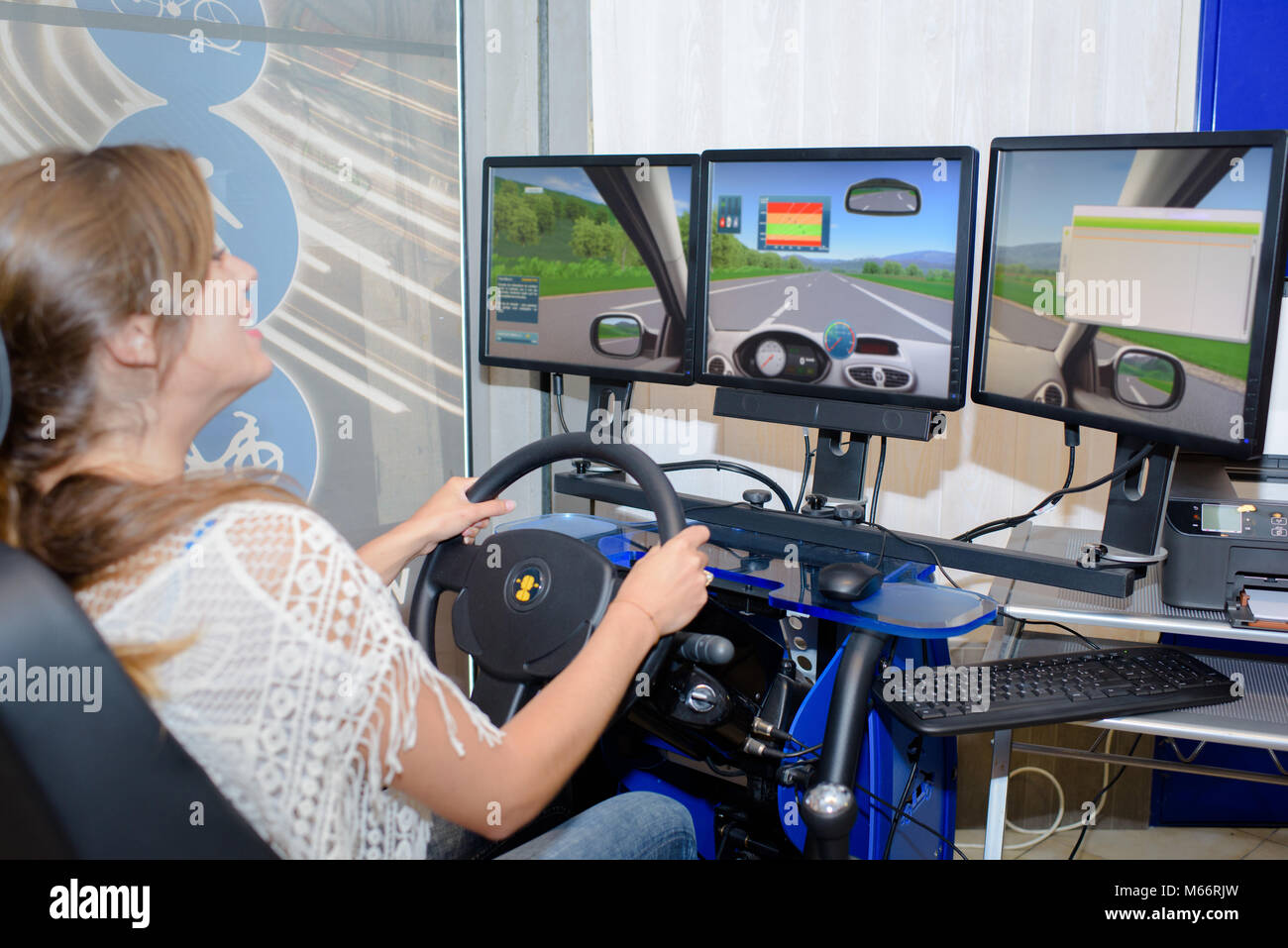 woman in the drive simulator Stock Photo - Alamy