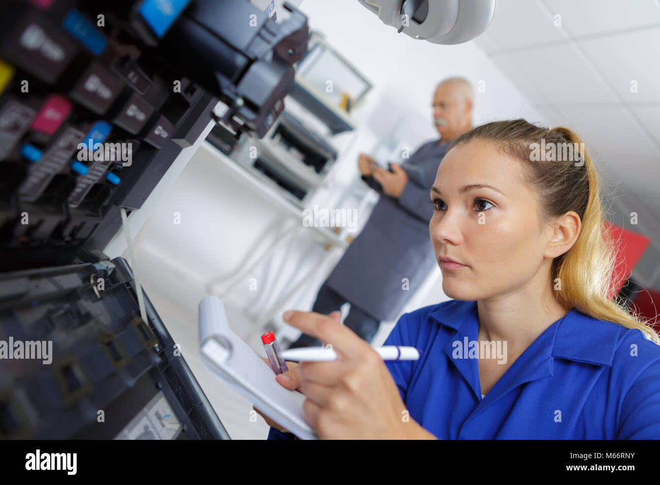 female technician working with transistor Stock Photo - Alamy