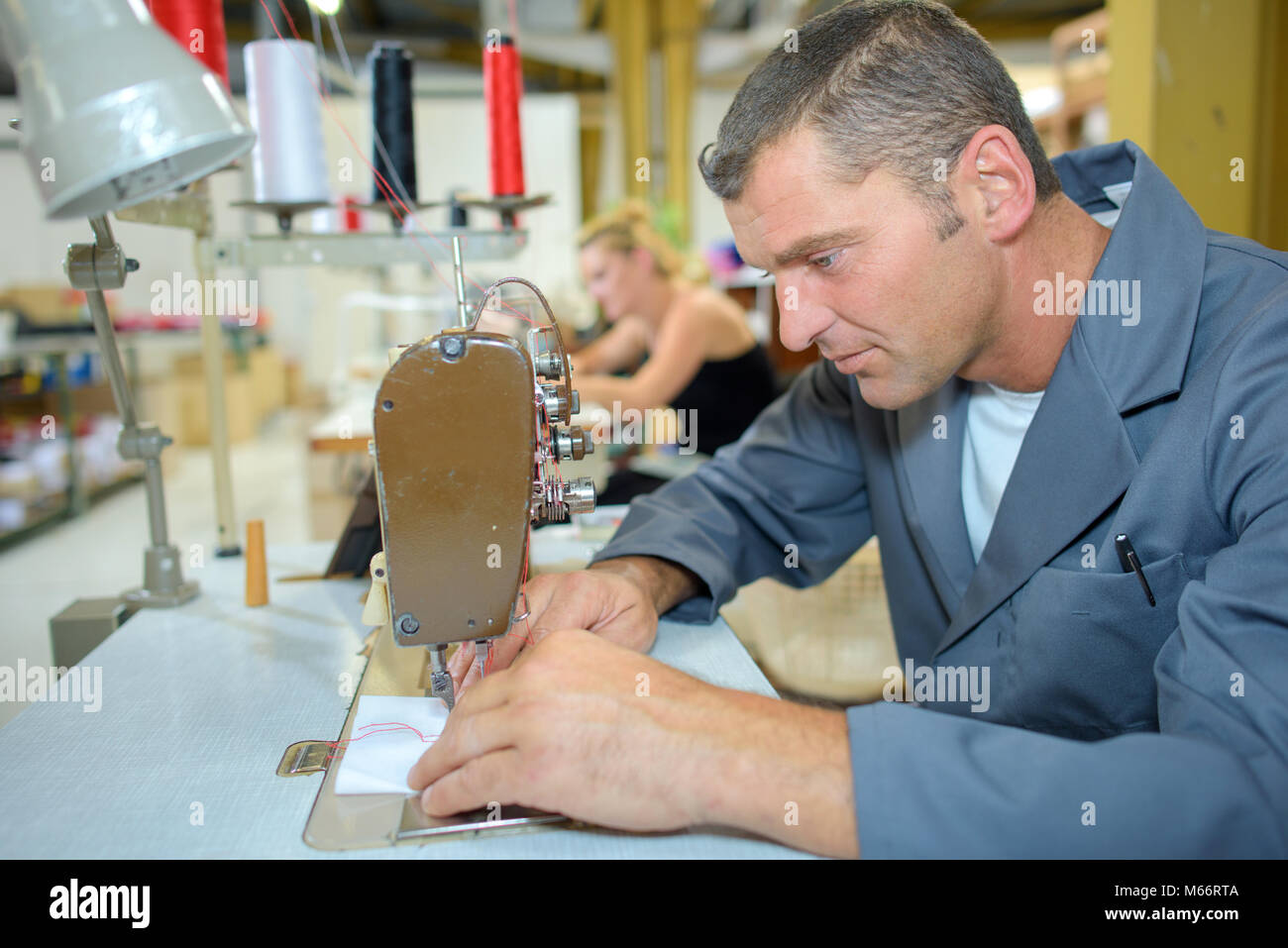 factory sewing worker Stock Photo - Alamy