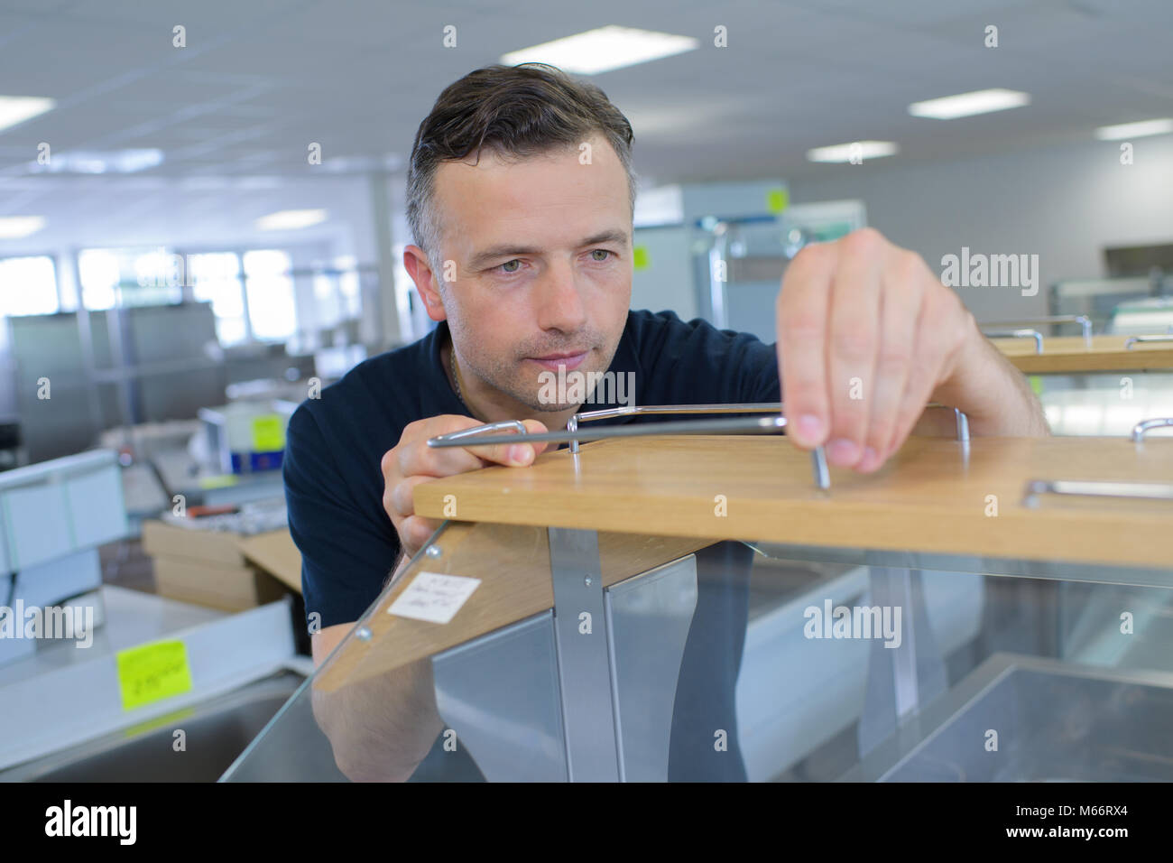 Tidying up the workplace hi-res stock photography and images - Alamy